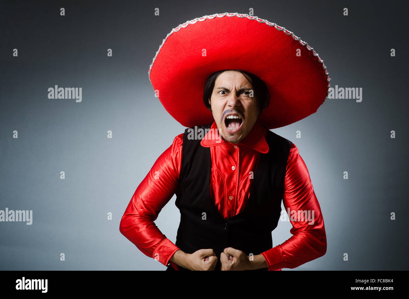 Person wearing sombrero hat in funny concept Stock Photo - Alamy