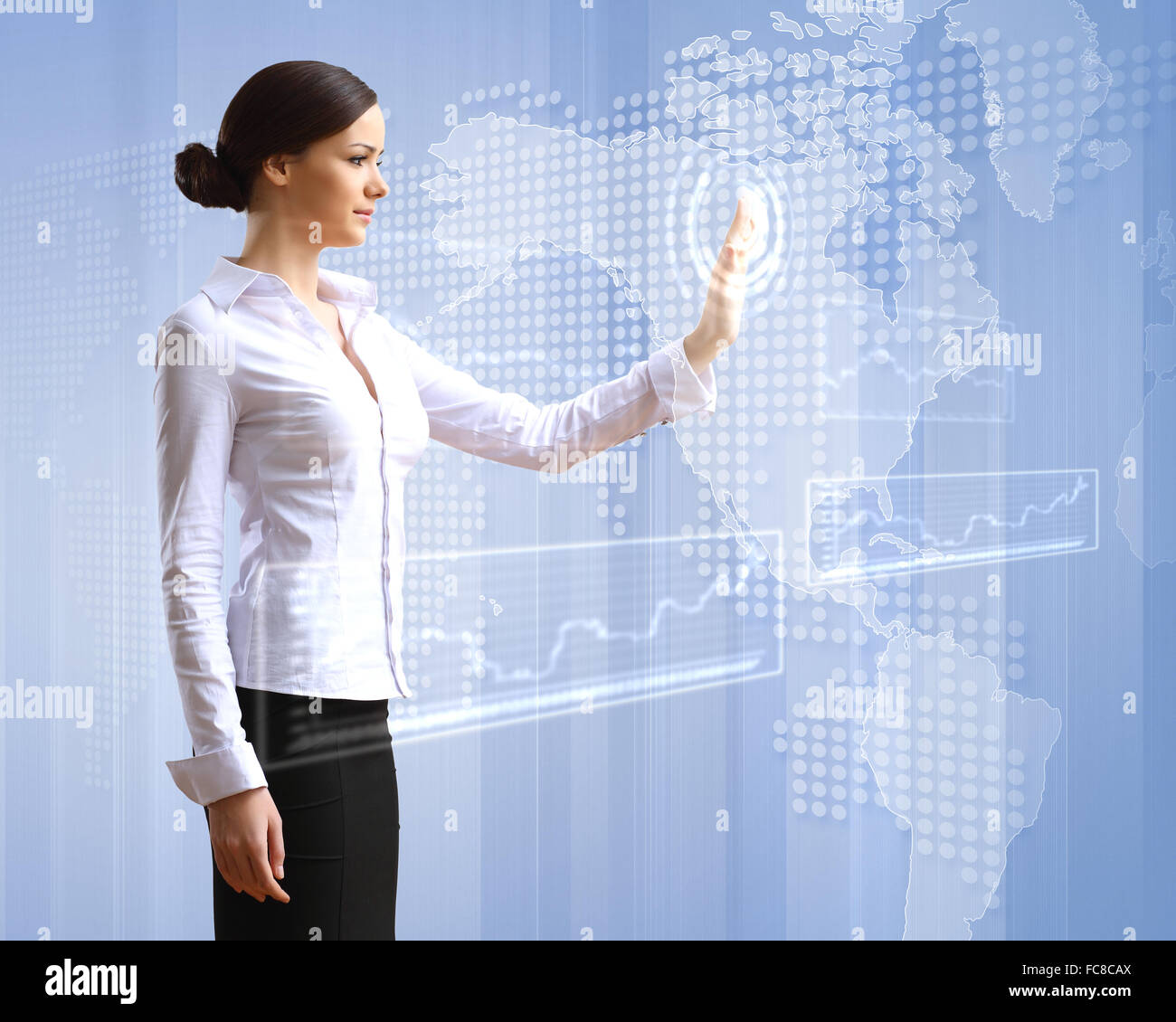 Young woman in business wear with touchscreen technology background ...