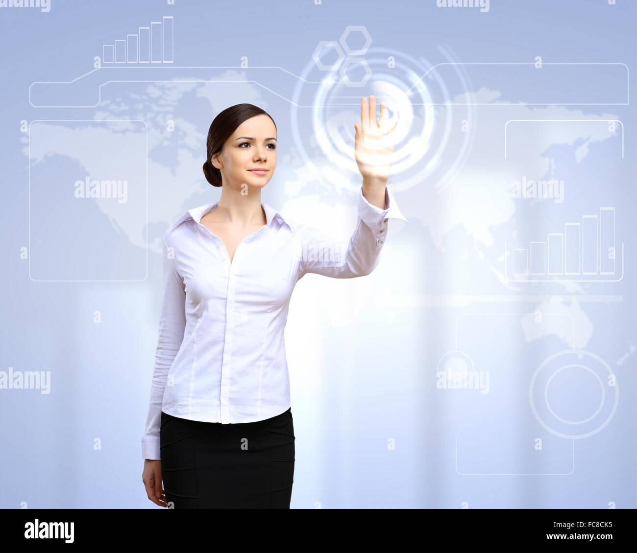 Young woman in business wear with touchscreen technology background ...