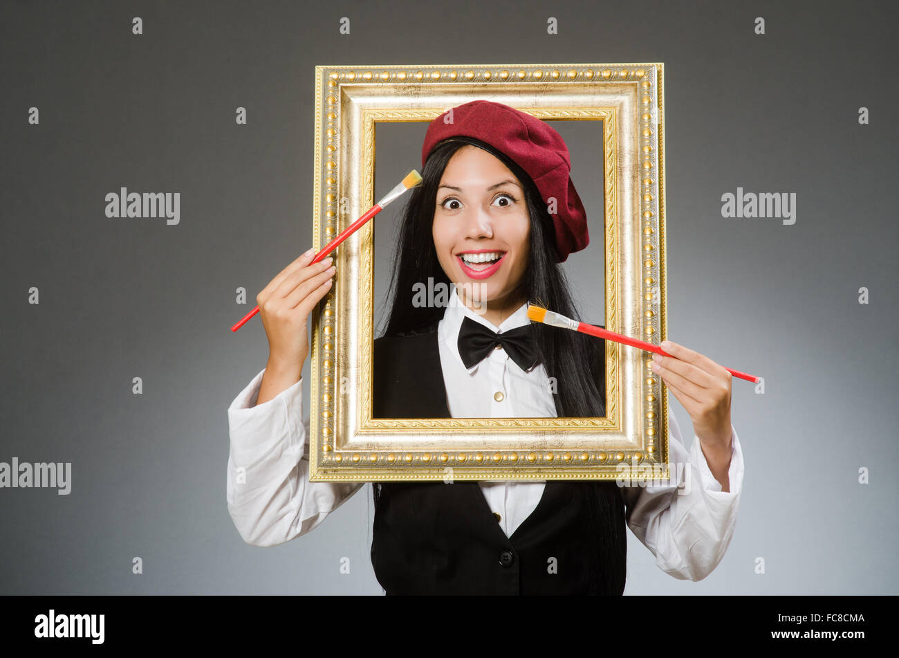 Funny artist working in the studio Stock Photo - Alamy
