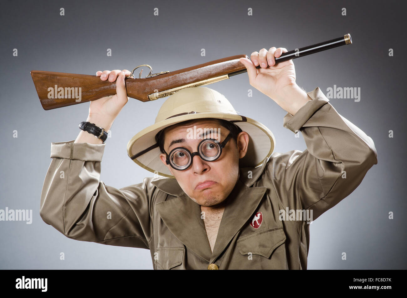 Funny hunter in hunting concept Stock Photo - Alamy