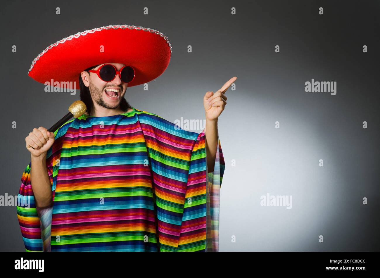 Person wearing sombrero hat in funny concept Stock Photo - Alamy
