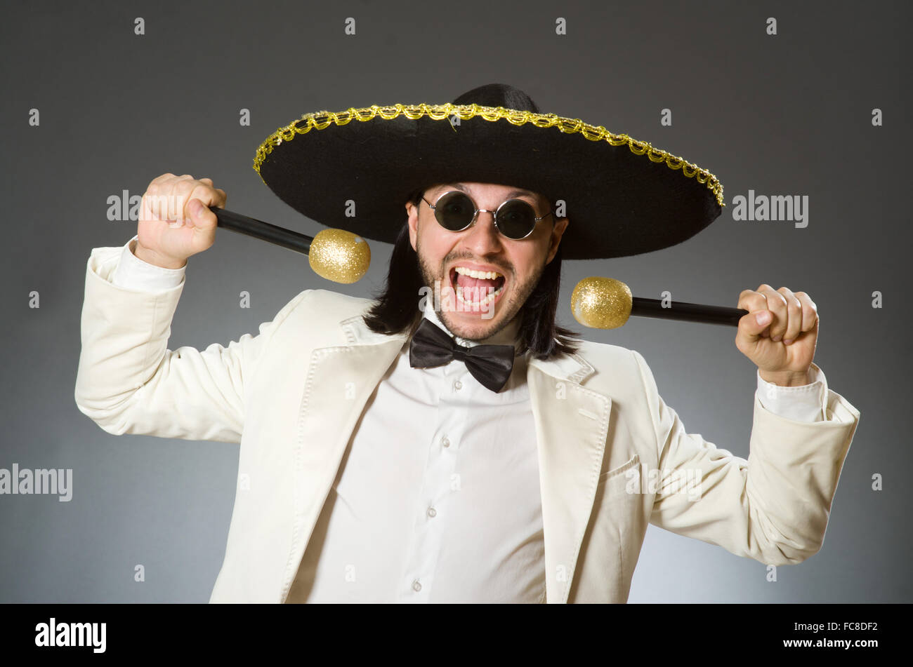 Person wearing sombrero hat in funny concept Stock Photo - Alamy