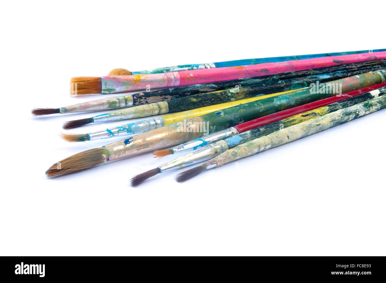 Several dirty used paint brushes Stock Photo - Alamy