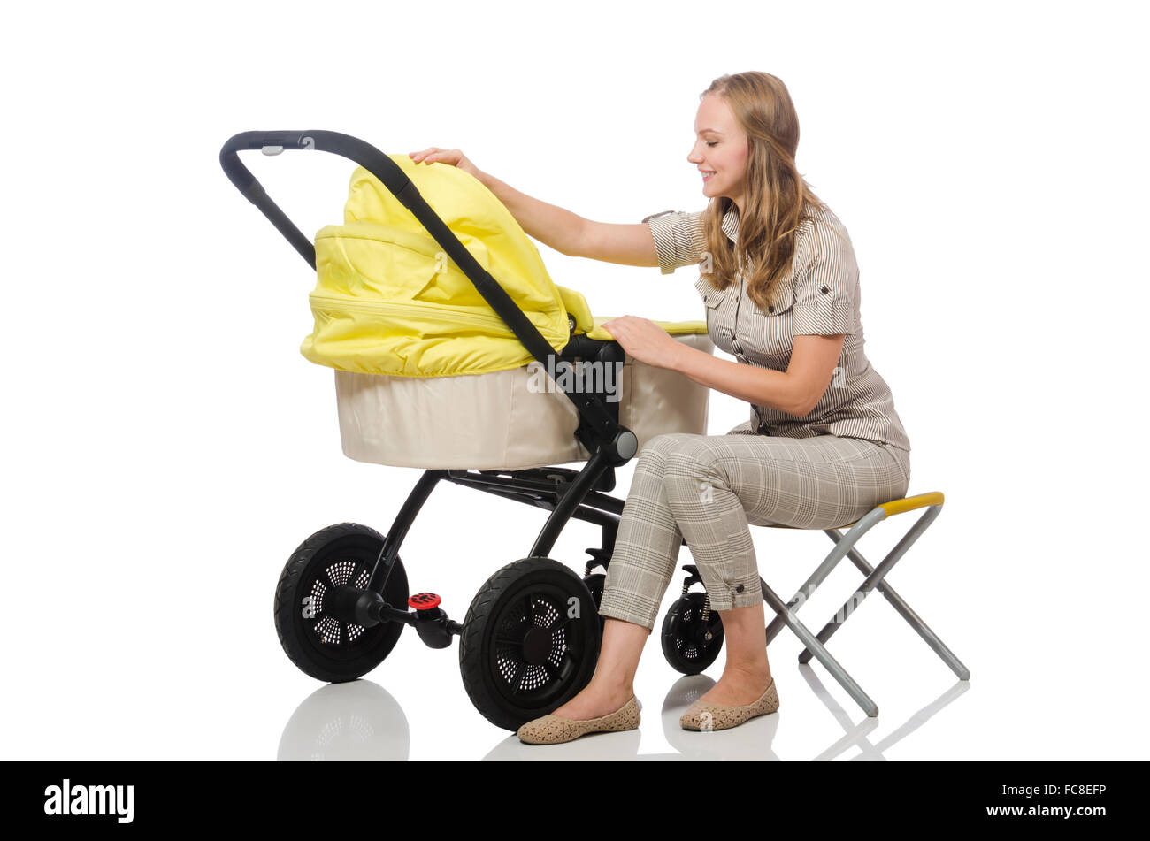 Woman with pram isolated on white Stock Photo - Alamy