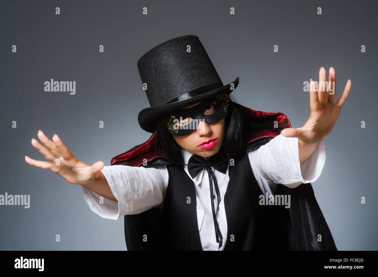 Woman magician in funny concept Stock Photo - Alamy