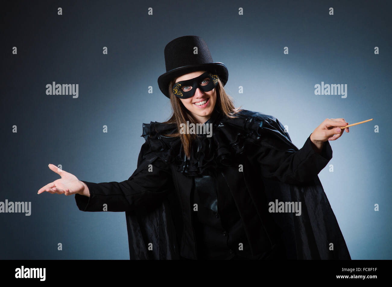 Woman magician in funny concept Stock Photo - Alamy