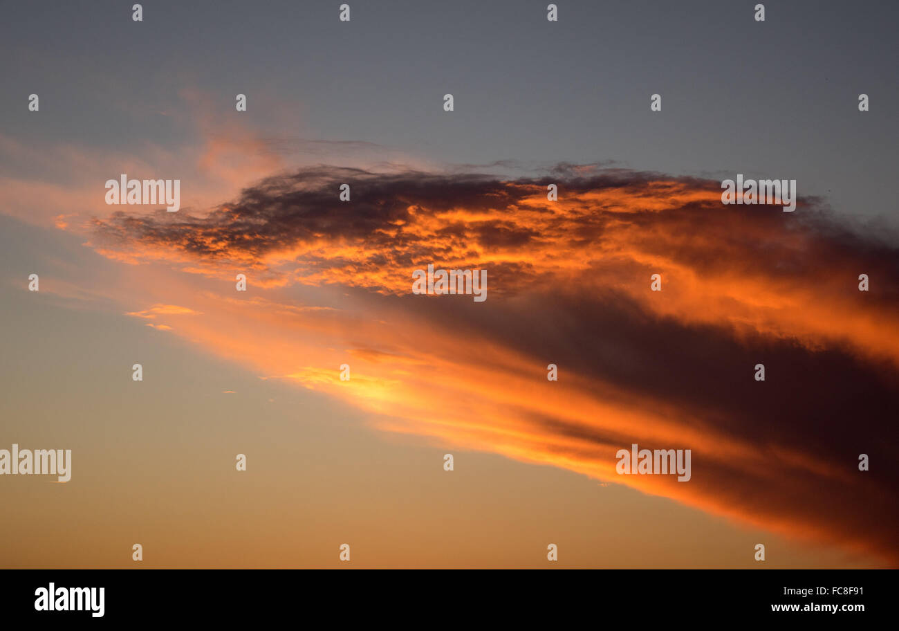 Brilliant red and orange sunlight on cloud Stock Photo - Alamy