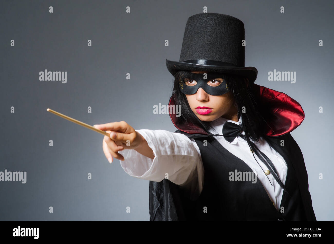 Woman magician in funny concept Stock Photo - Alamy