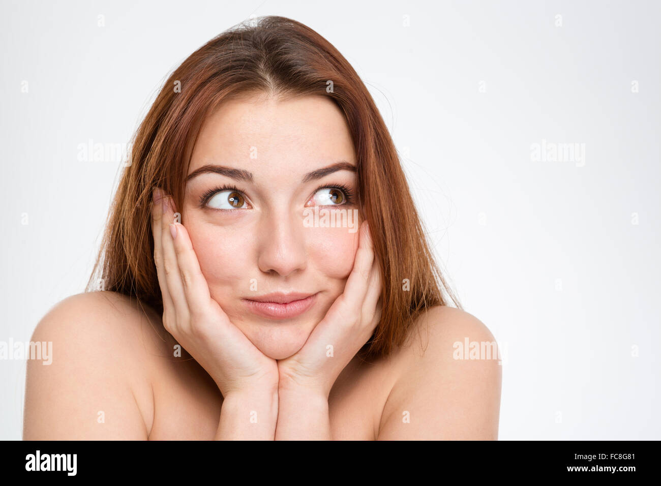 Closeup portrait of pretty cute young woman with hands on cheeks over ...