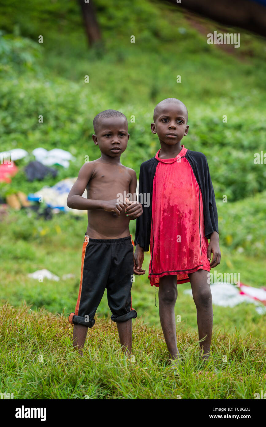 Local villagers washing and drying clothes by the river in Jinja ...