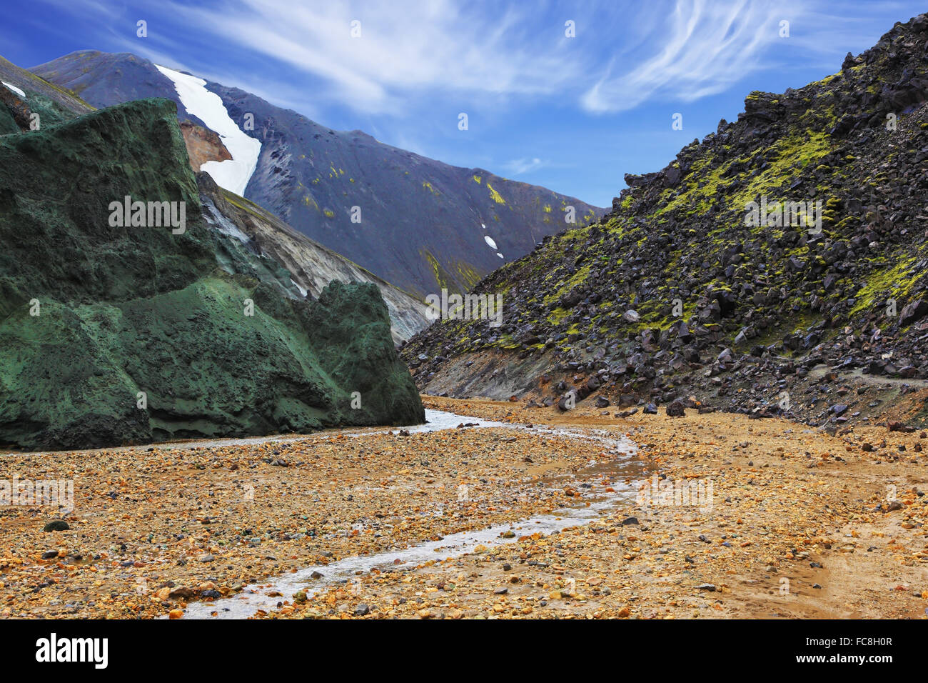 Green rock in the gorge Stock Photo - Alamy