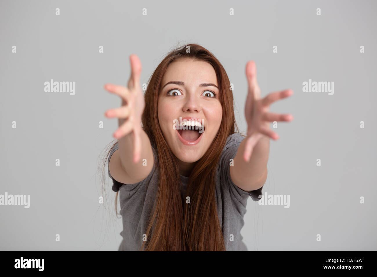 Happy excited woman shouting hi-res stock photography and images - Alamy