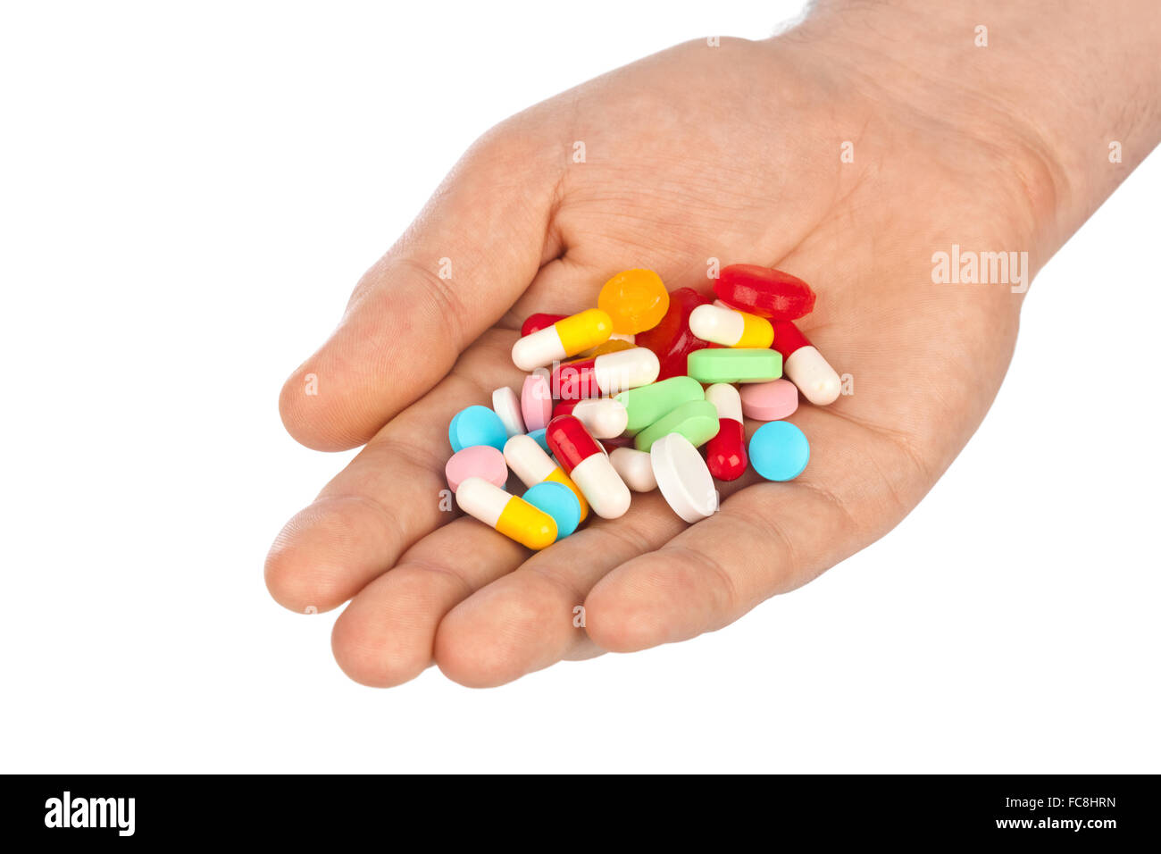 Hand holding stack of tablets hi-res stock photography and images - Alamy