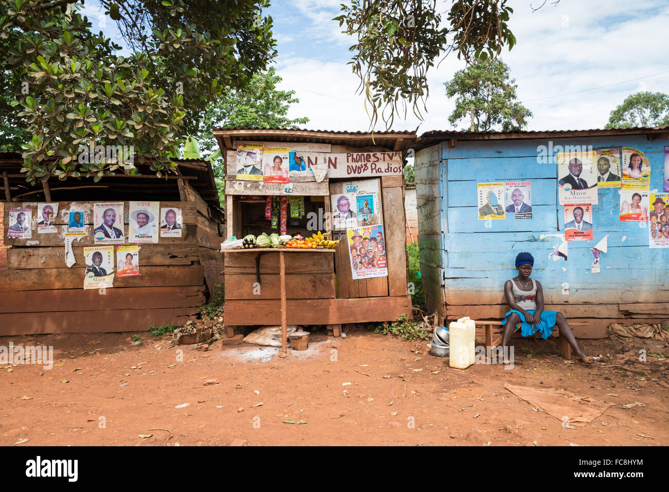 local woman selling food in their shop, Near Jinja, Uganda, Africa ...