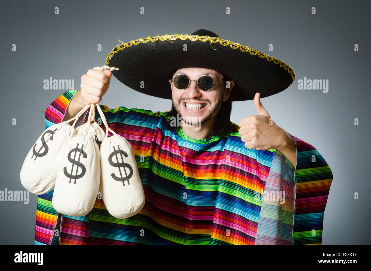 Mexican man with money sacks Stock Photo - Alamy