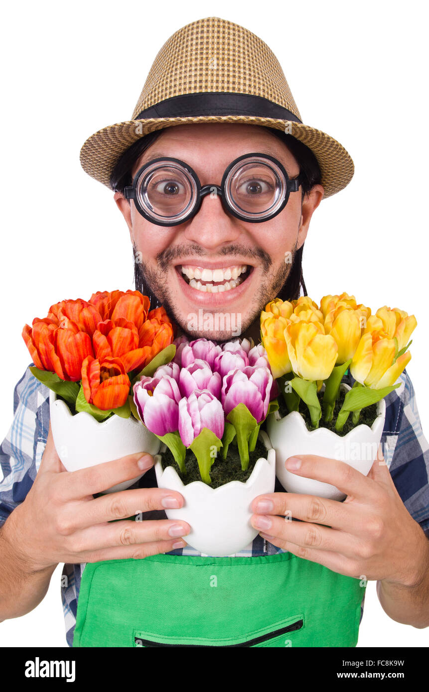 Man gardener with flowers on white Stock Photo - Alamy