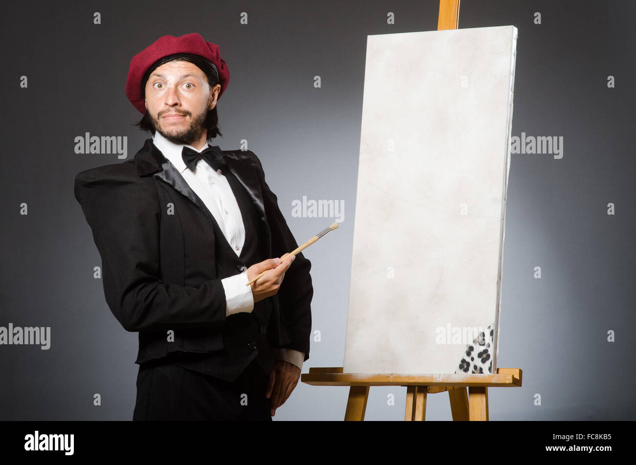 Funny artist working in the studio Stock Photo - Alamy