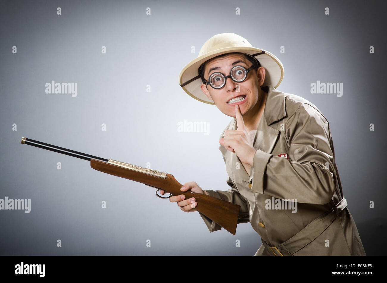 Funny hunter in hunting concept Stock Photo - Alamy