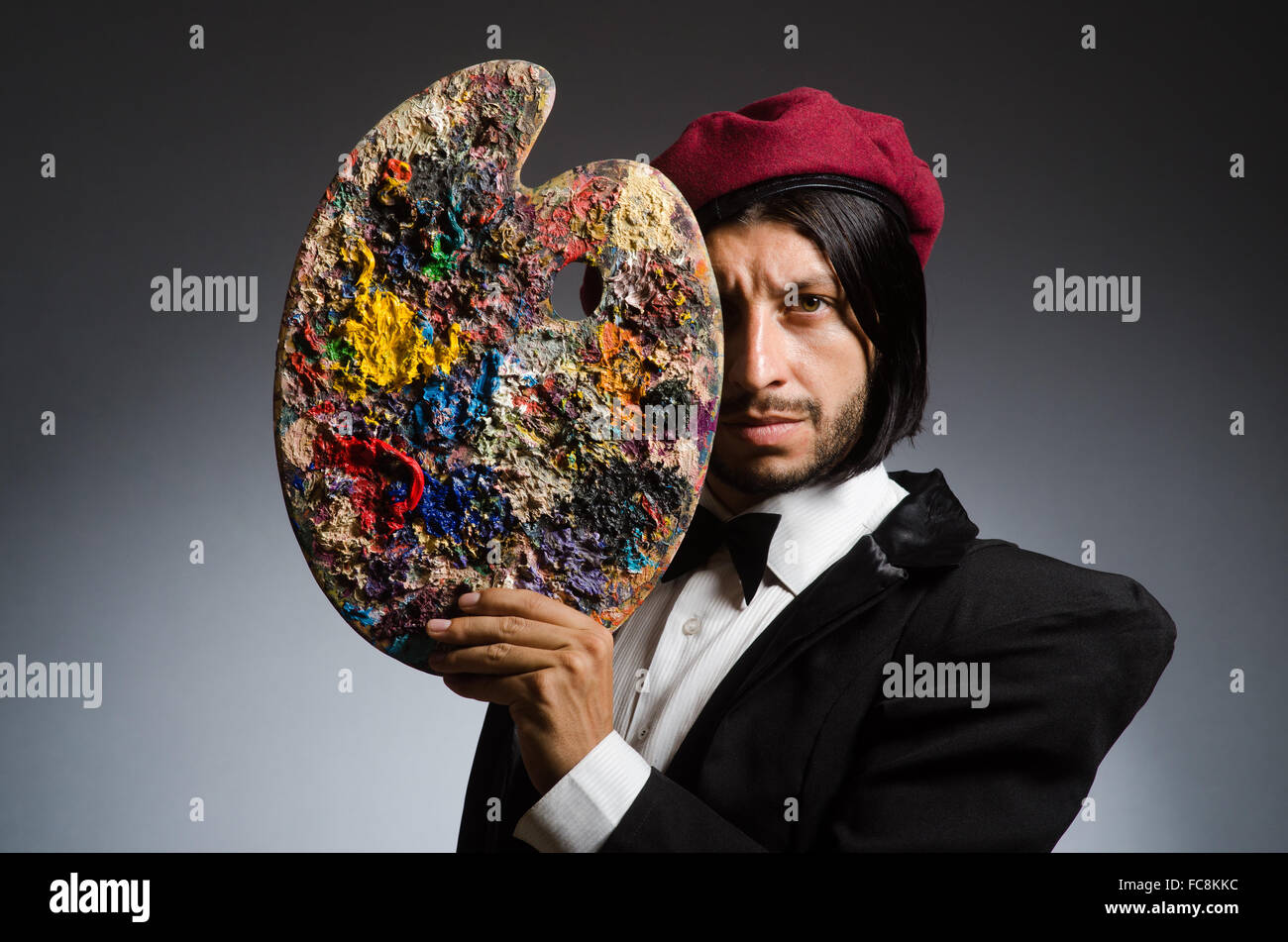 Funny artist working in the studio Stock Photo - Alamy