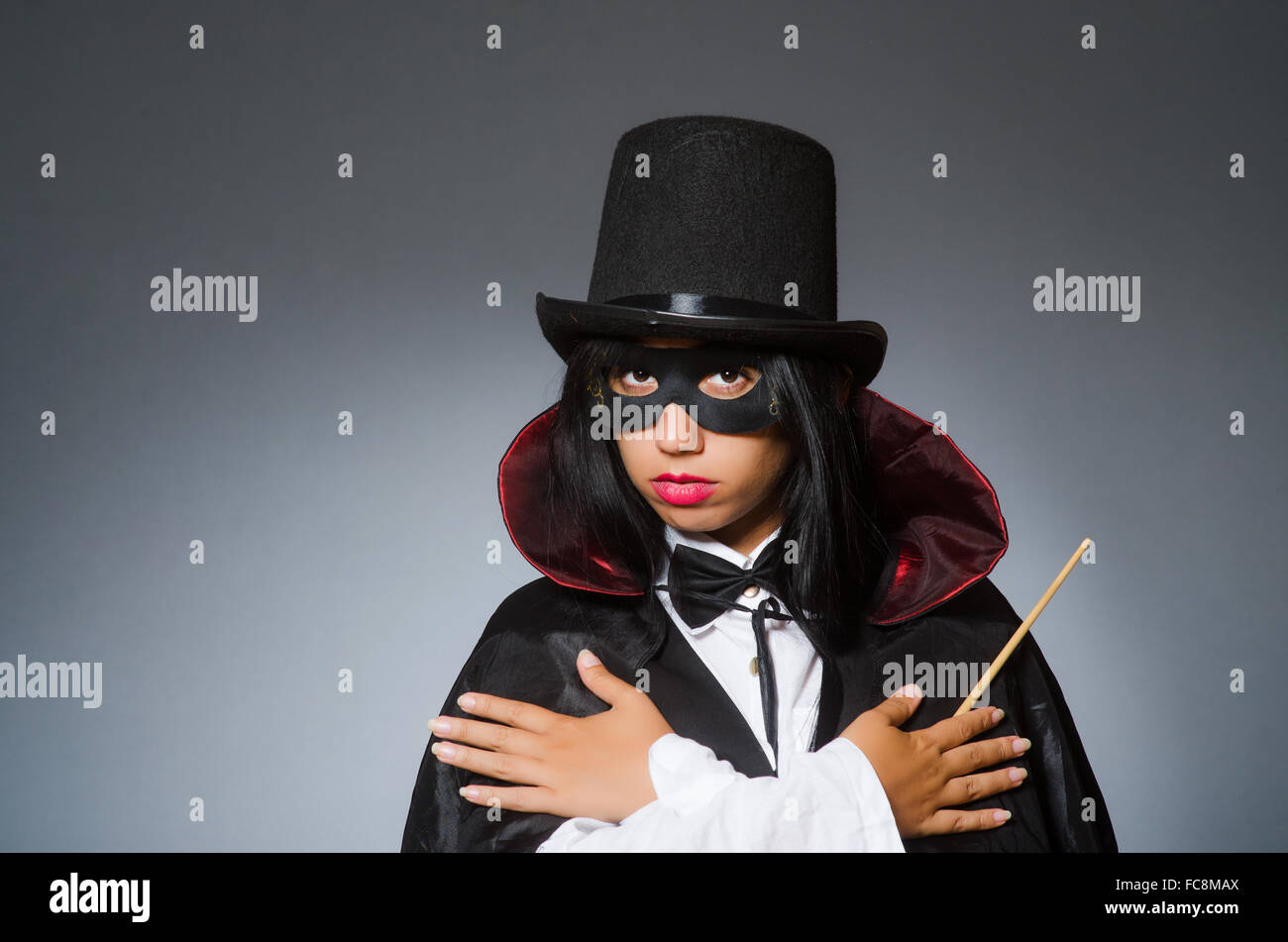 Woman magician in funny concept Stock Photo - Alamy