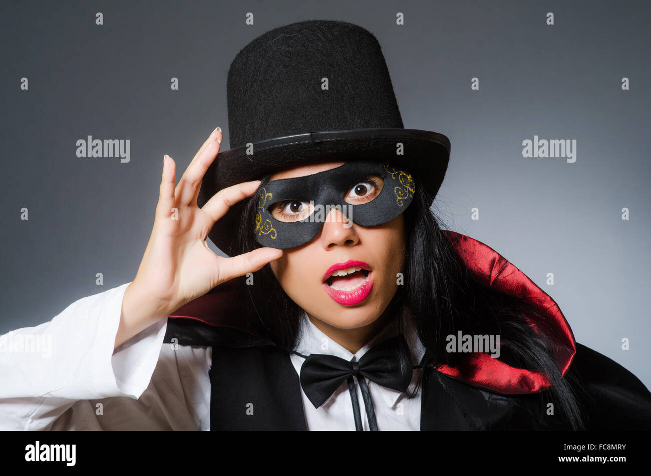 Woman magician in funny concept Stock Photo - Alamy