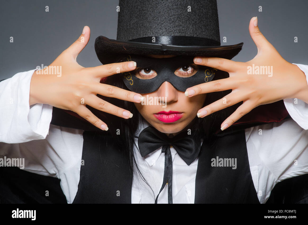 Woman magician in funny concept Stock Photo - Alamy