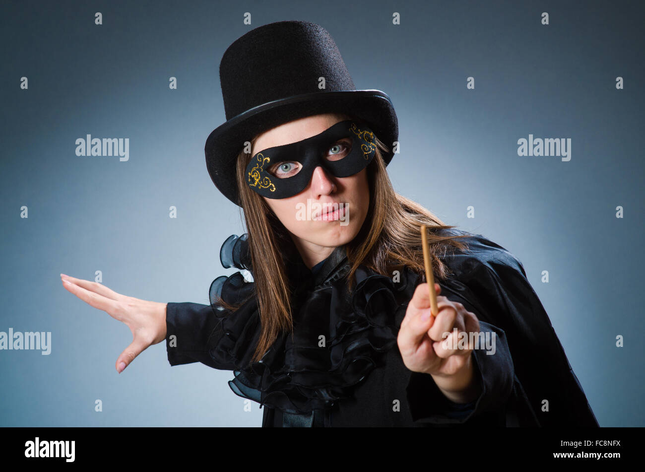 Woman magician in funny concept Stock Photo - Alamy
