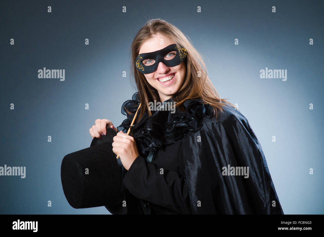 Woman magician in funny concept Stock Photo - Alamy
