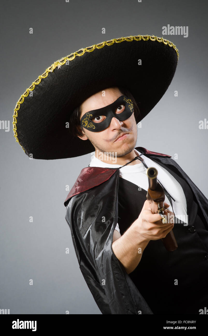 Person wearing sombrero hat in funny concept Stock Photo - Alamy
