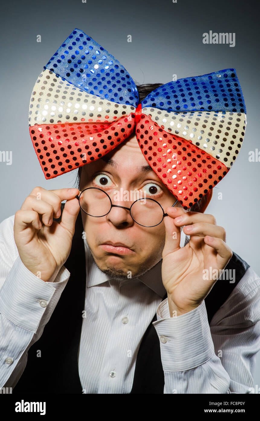 Funny man with giant bow tie Stock Photo - Alamy