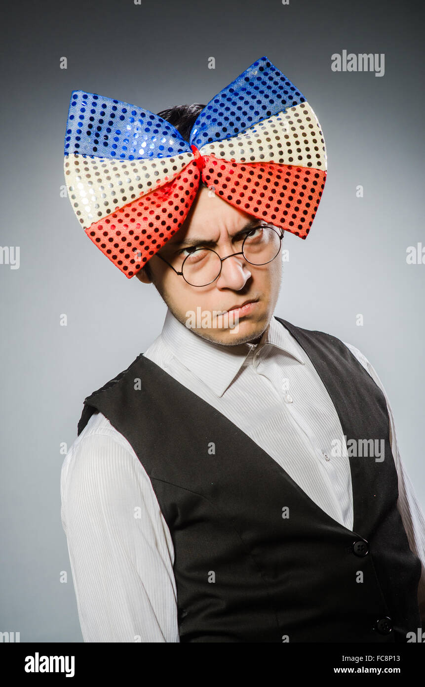 Funny man with giant bow tie Stock Photo - Alamy