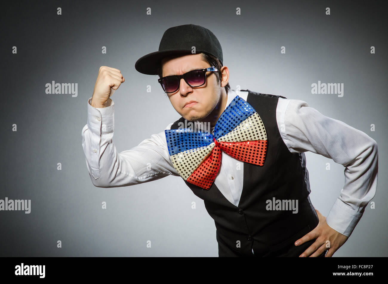 Funny man with giant bow tie Stock Photo - Alamy