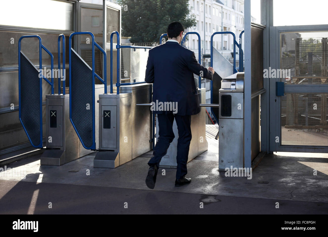 turnstile in the underground Stock Photo - Alamy