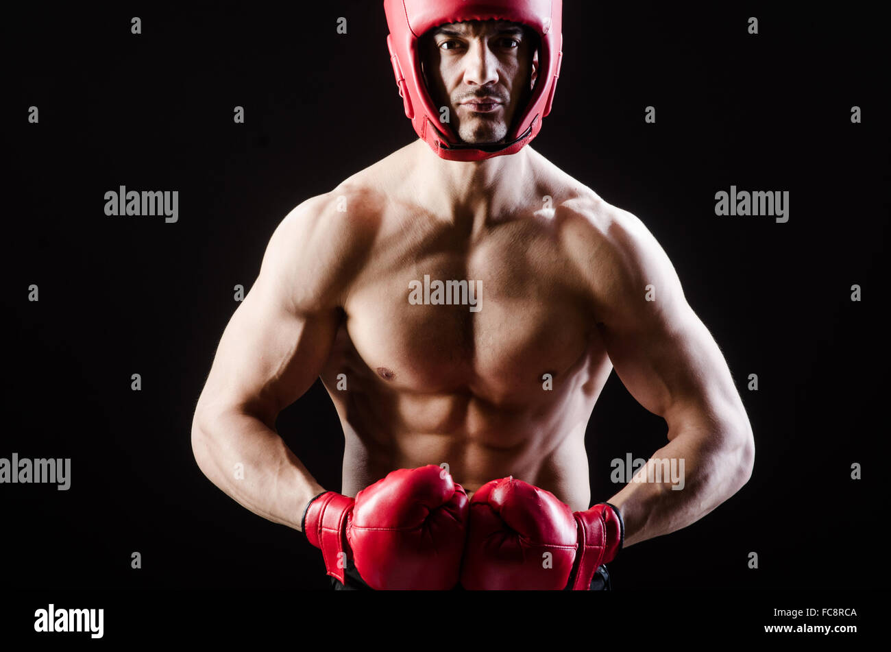 Muscular man in boxing concept Stock Photo - Alamy