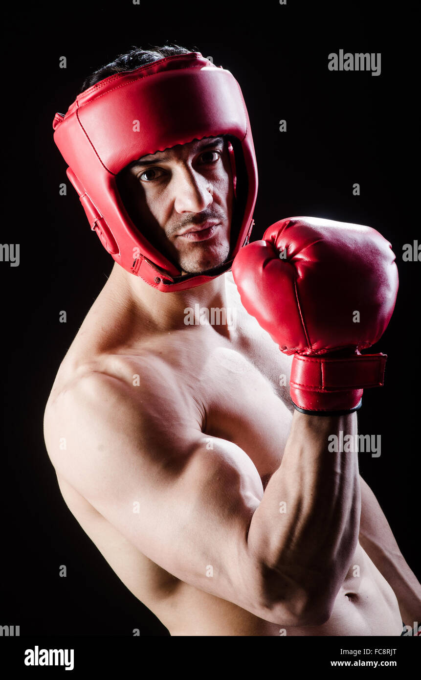 Muscular man in boxing concept Stock Photo - Alamy