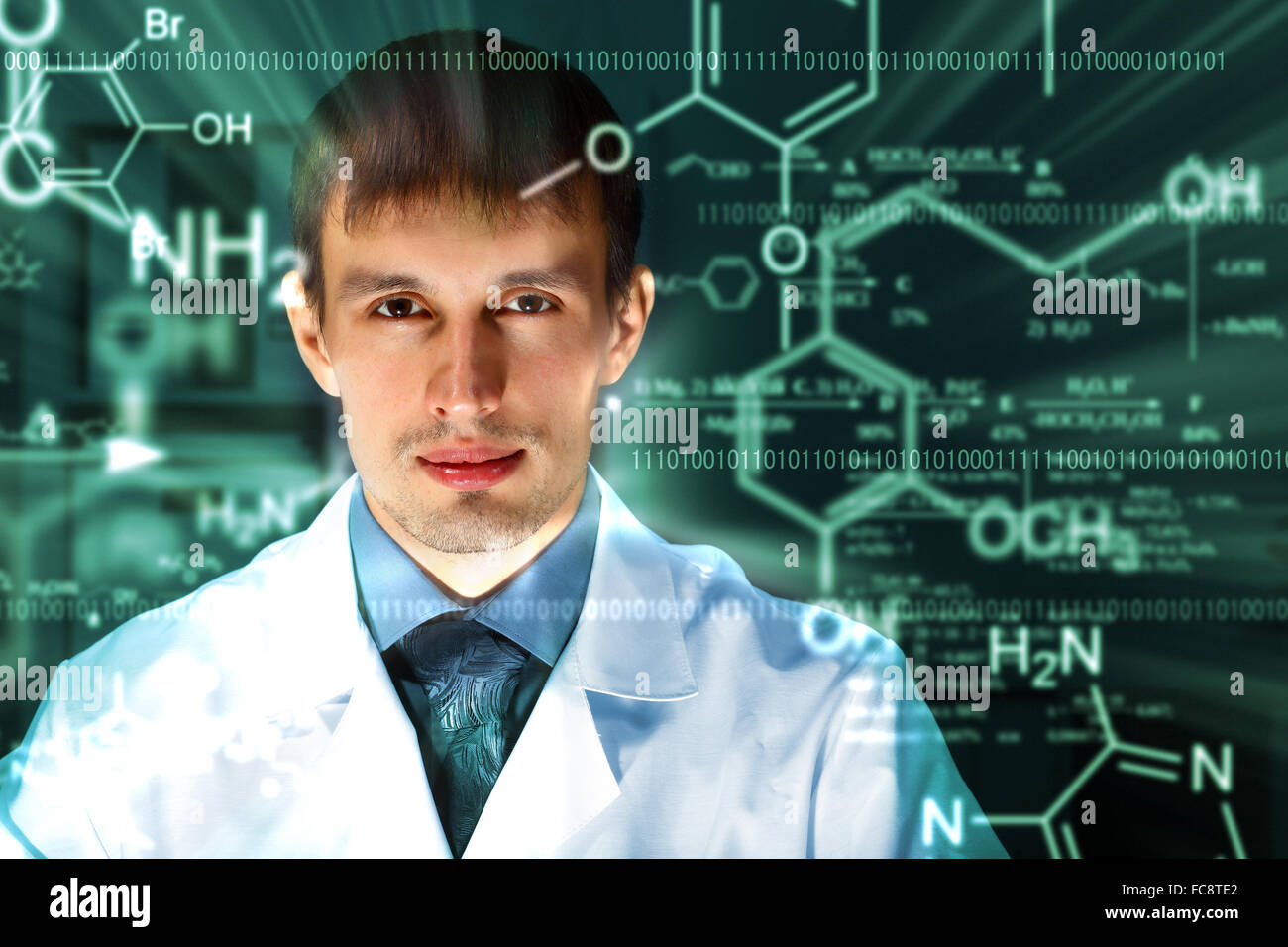 Young chemist in white uniform working in laboratory Stock Photo - Alamy