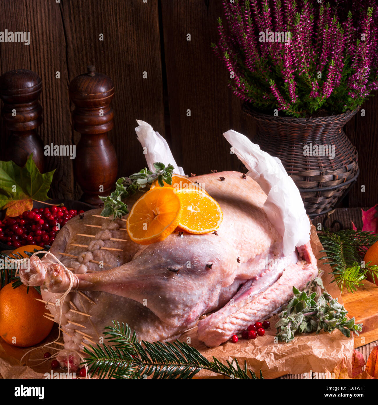 Raw goose in marinade Stock Photo - Alamy