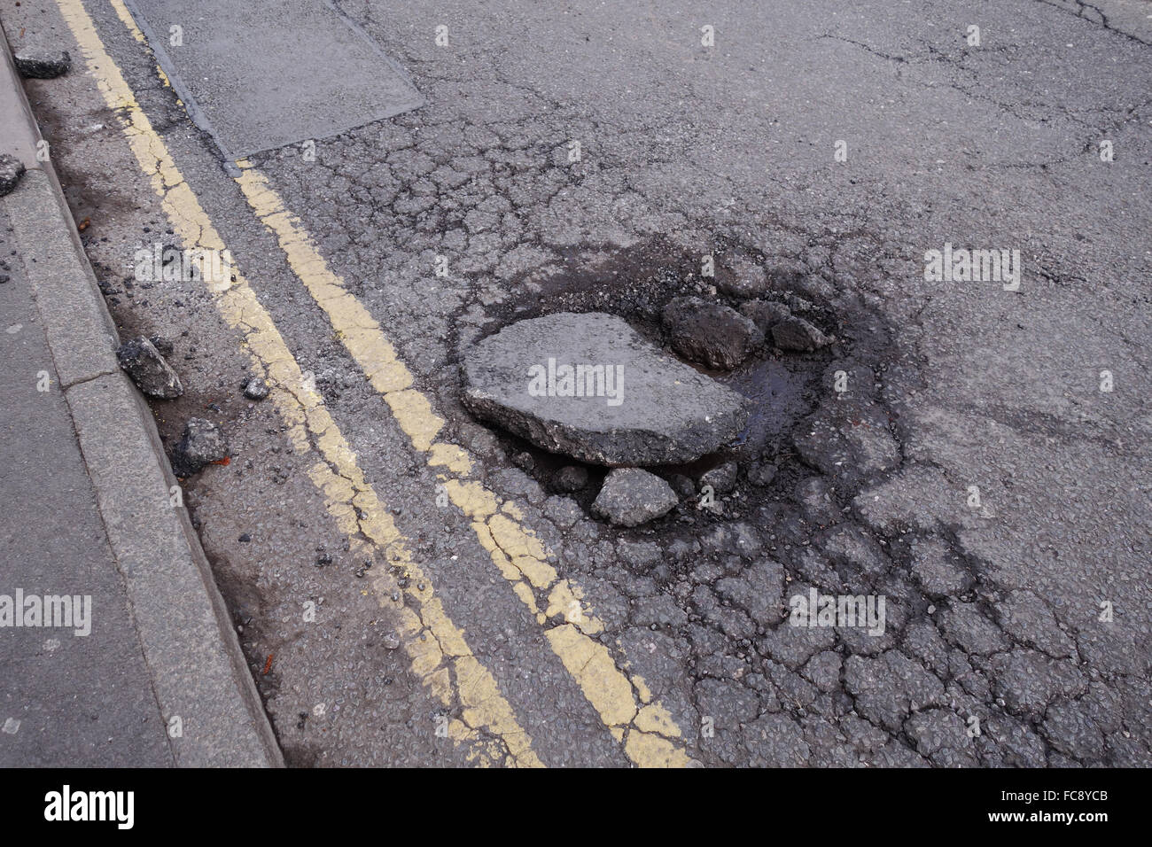 Pot hole in road hi-res stock photography and images - Alamy