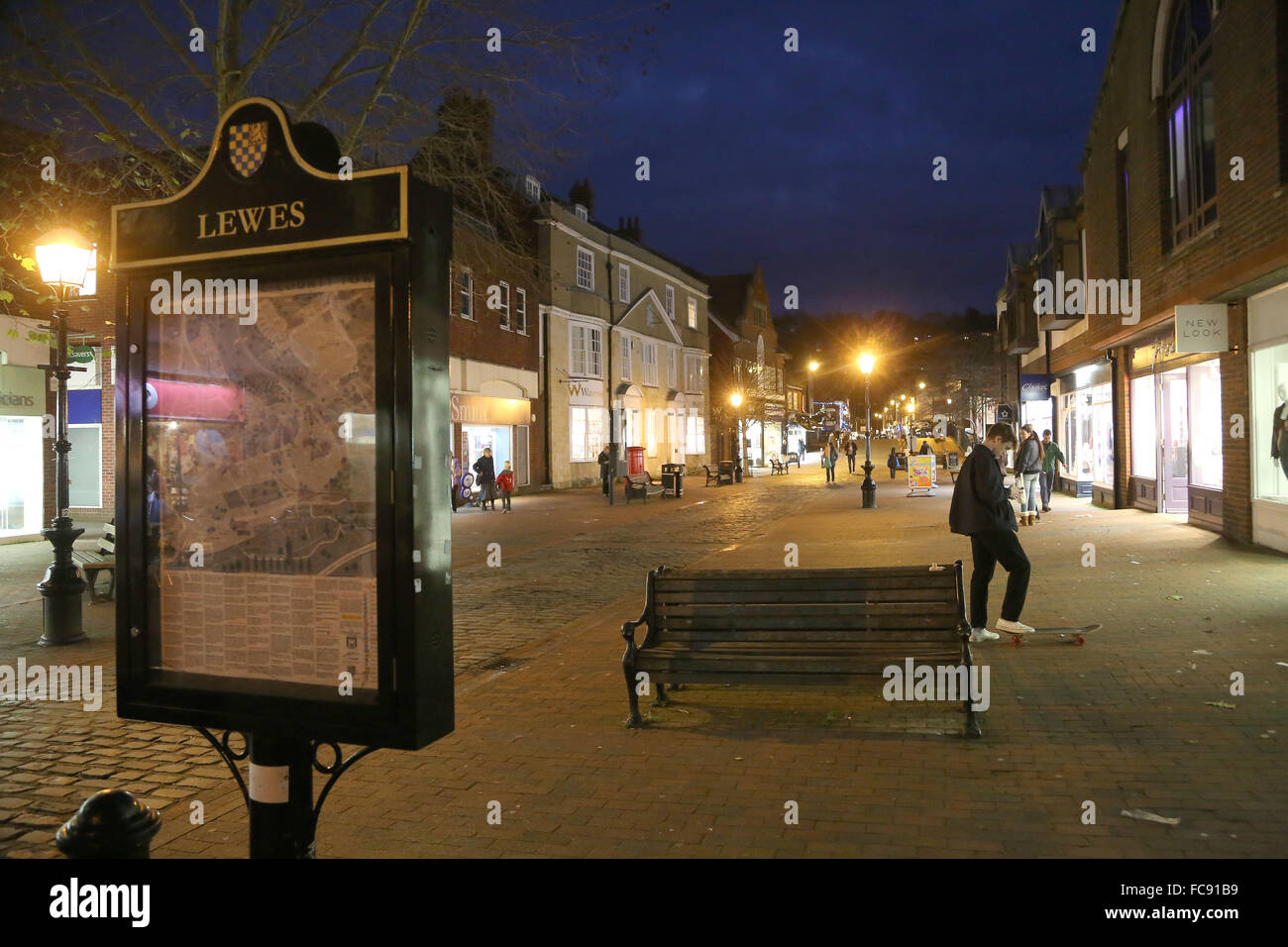 Lewes East Sussex by night on a December evening lit by street lights ...