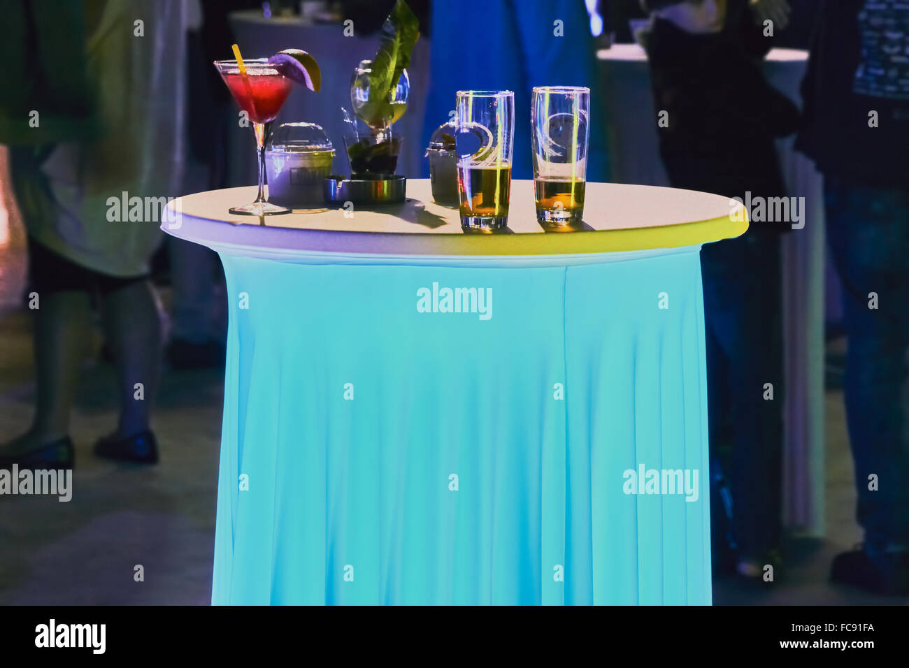 Table with drinks on disco Stock Photo - Alamy