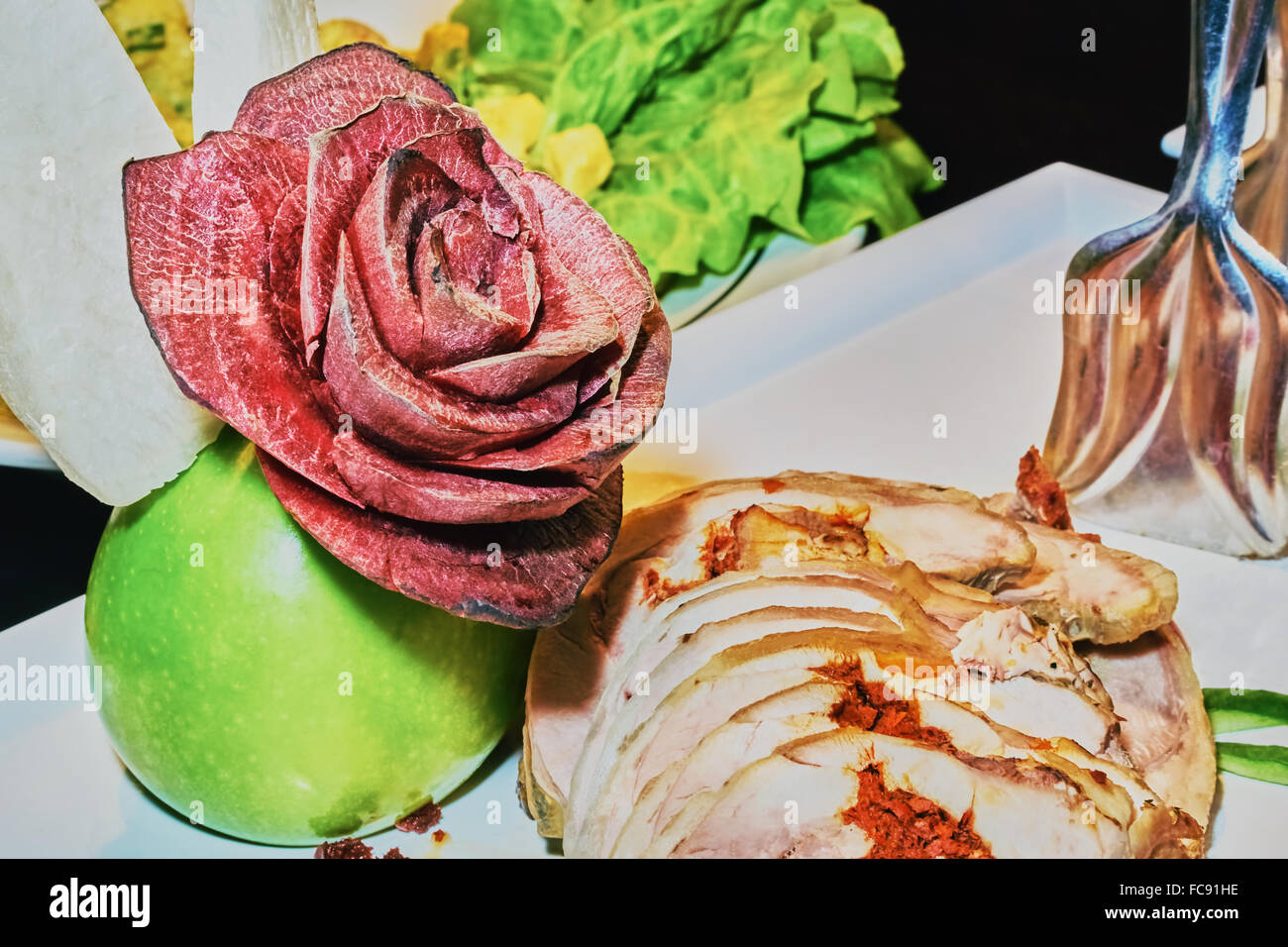 Rose cut from beet (decorative feature dishes Stock Photo - Alamy