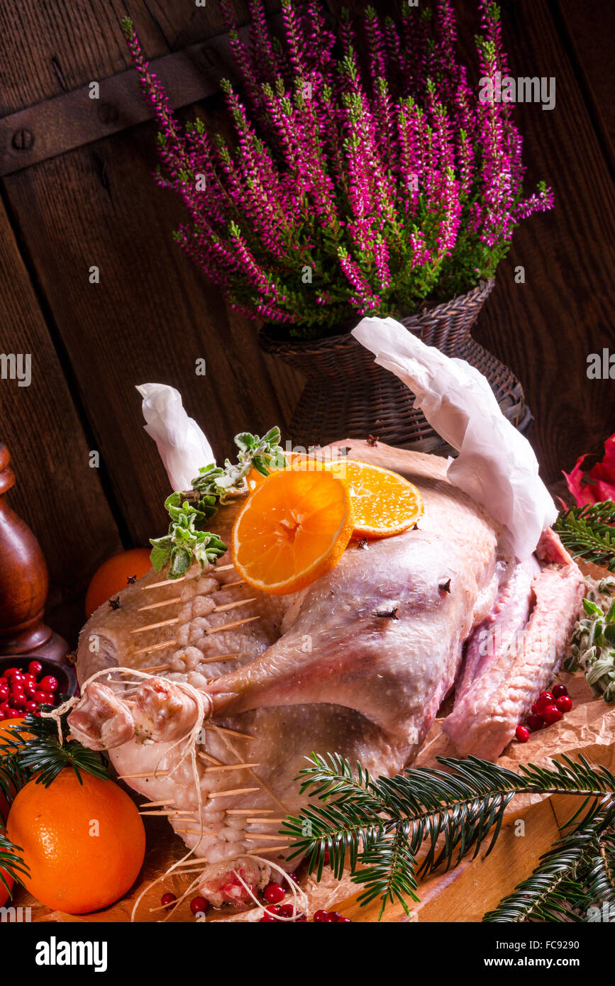 Raw goose in marinade Stock Photo - Alamy