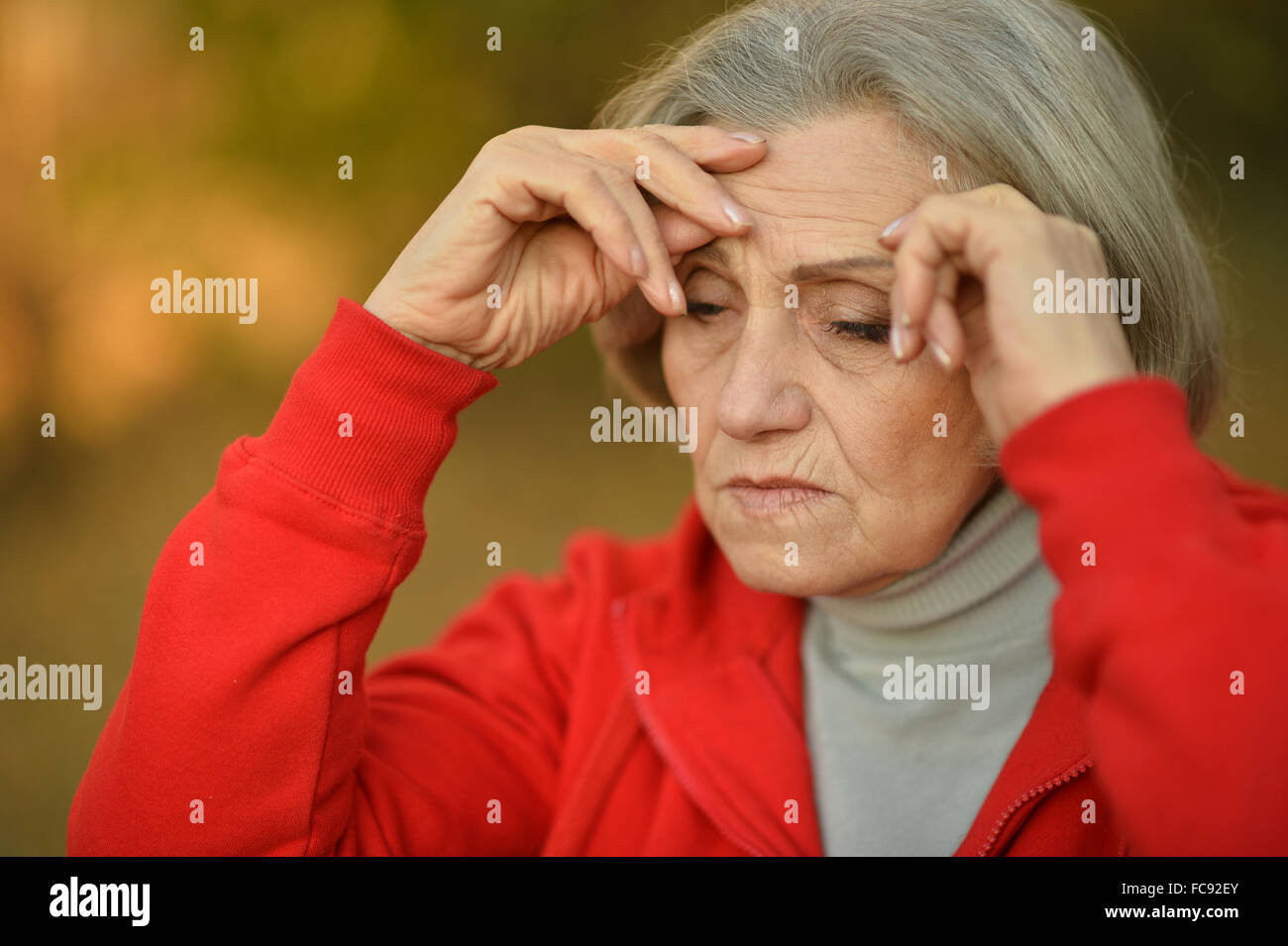 Nice sad old woman Stock Photo - Alamy