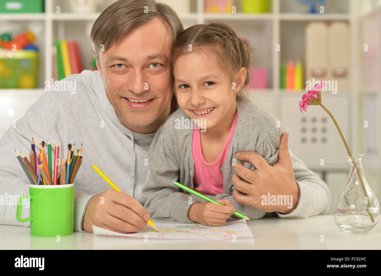 happy father and daughter painting Stock Photo - Alamy
