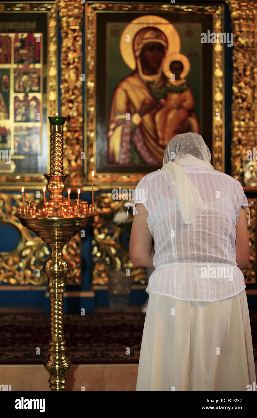 Praying woman hi-res stock photography and images - Alamy