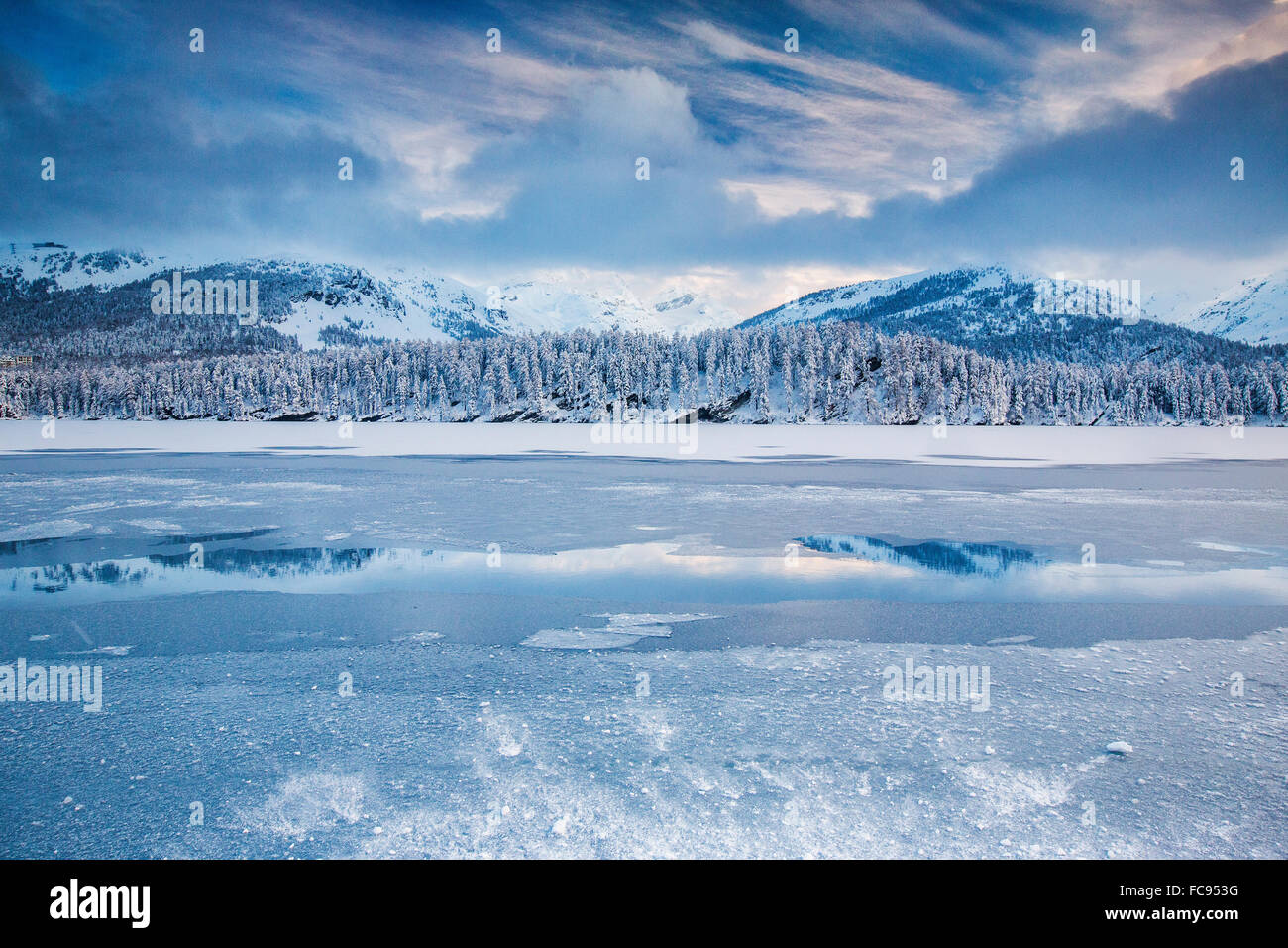 The shore of the frozen Lake Sils, Upper Engadine, Canton of Grisons ...
