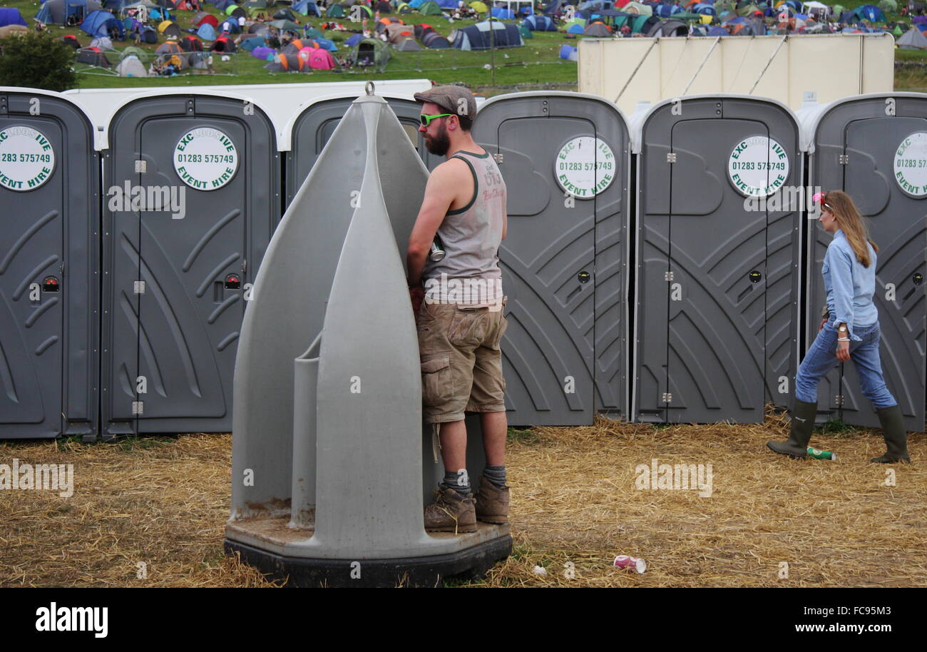 Open urinal and portaloo area at the Y Not festival, Derbyshire Stock ...