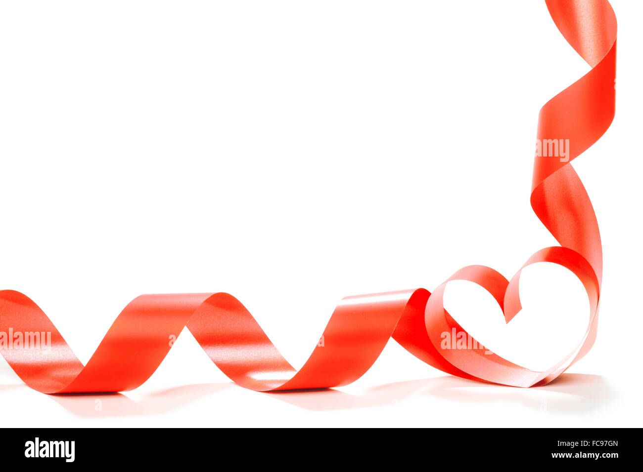 red heart ribbon isolated on white background Stock Photo - Alamy