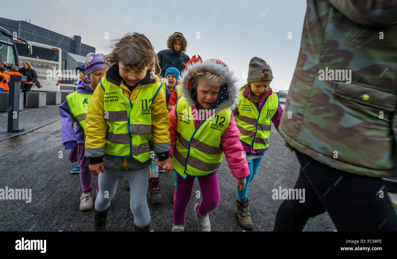 Children walking in the rain, Reykjavik, Iceland Stock Photo - Alamy